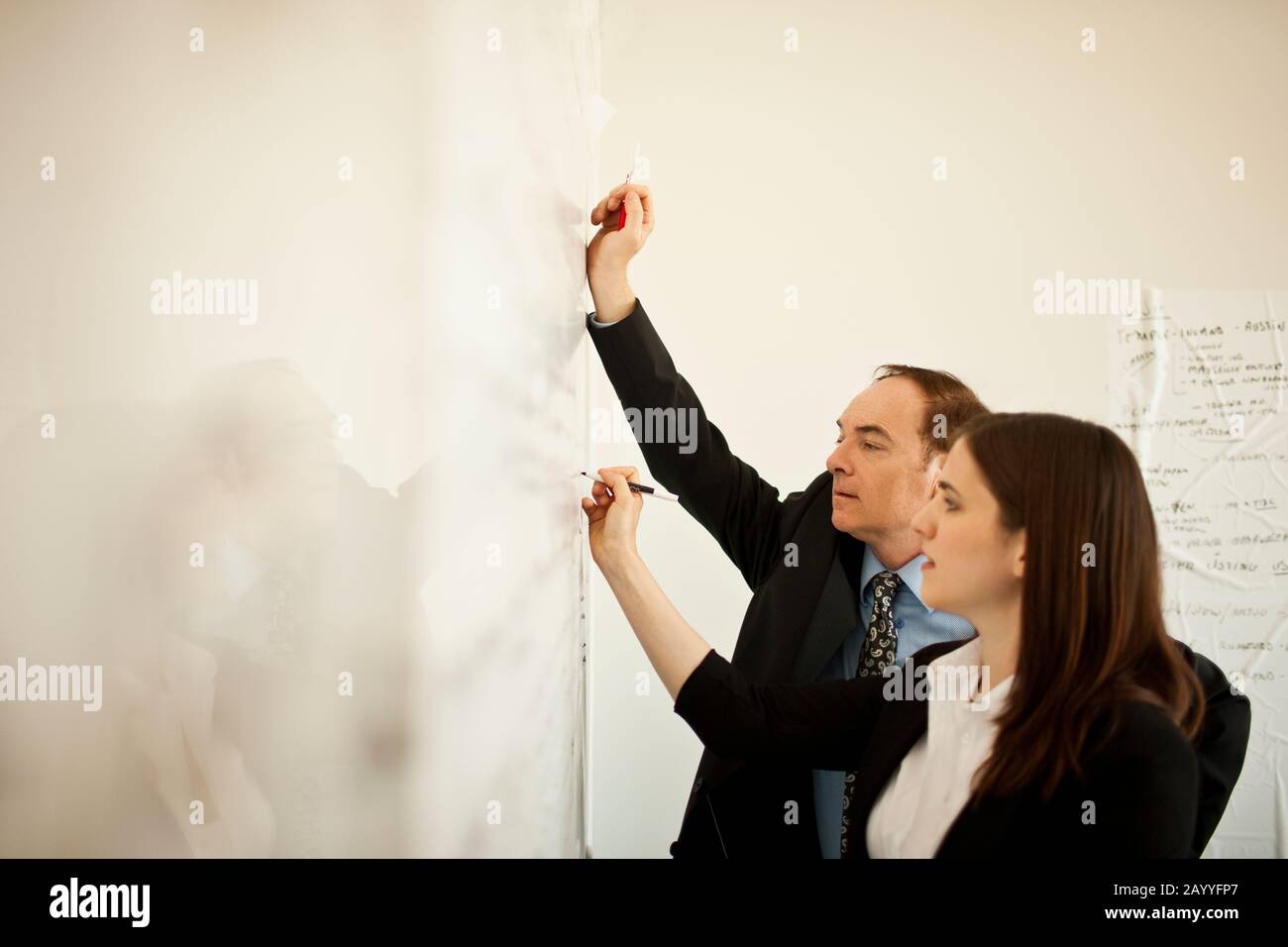 Selective focus thoughtful businessman writing hi-res stock photography ...