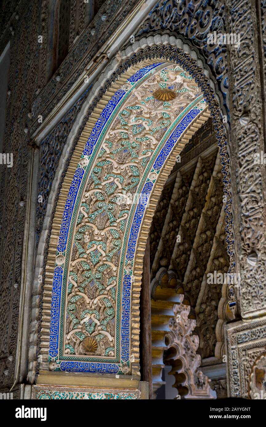 Detail of Moorish architecture (arches) in the Alcazar, a royal palace ...
