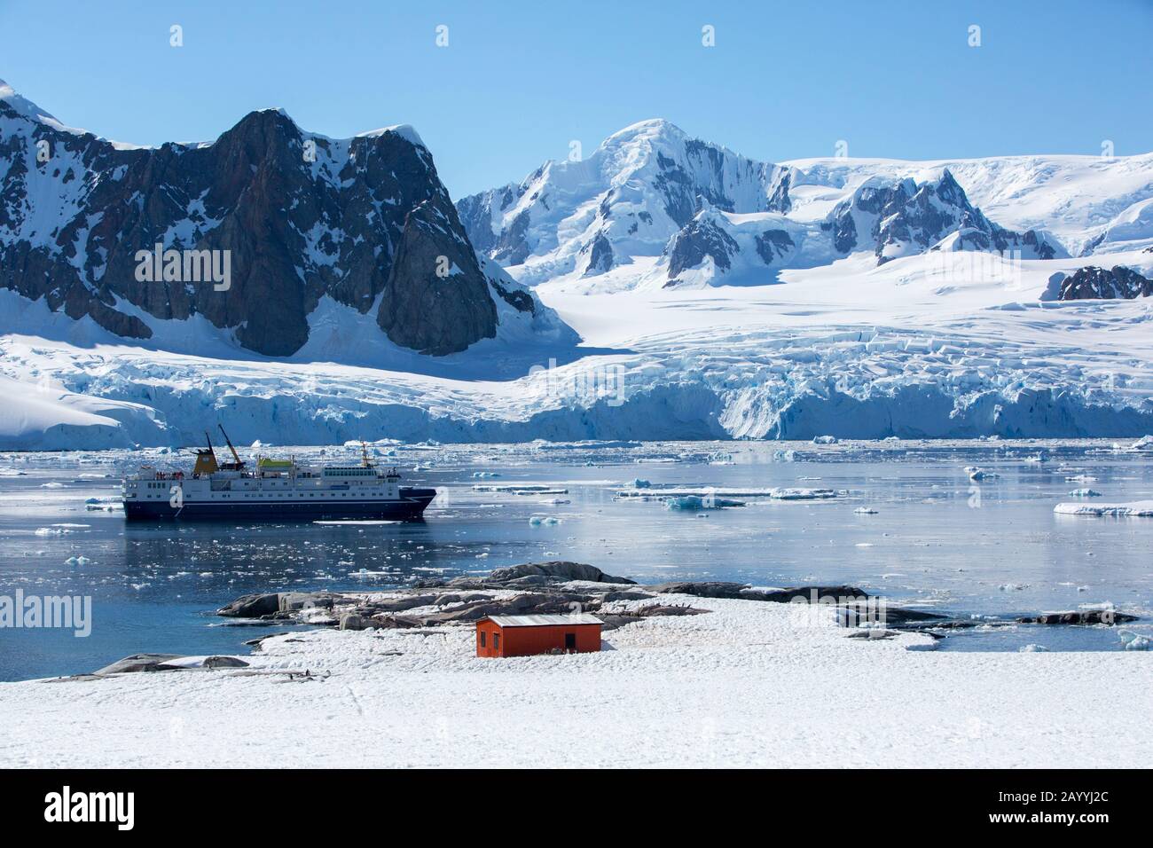 The Ocean Nova, an expedition cruise ship moored off Peterman Island ...