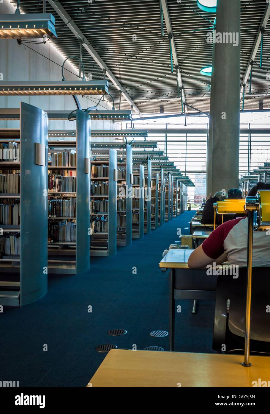 Back of people sitting on desks at the Burton Barr Central Library in ...