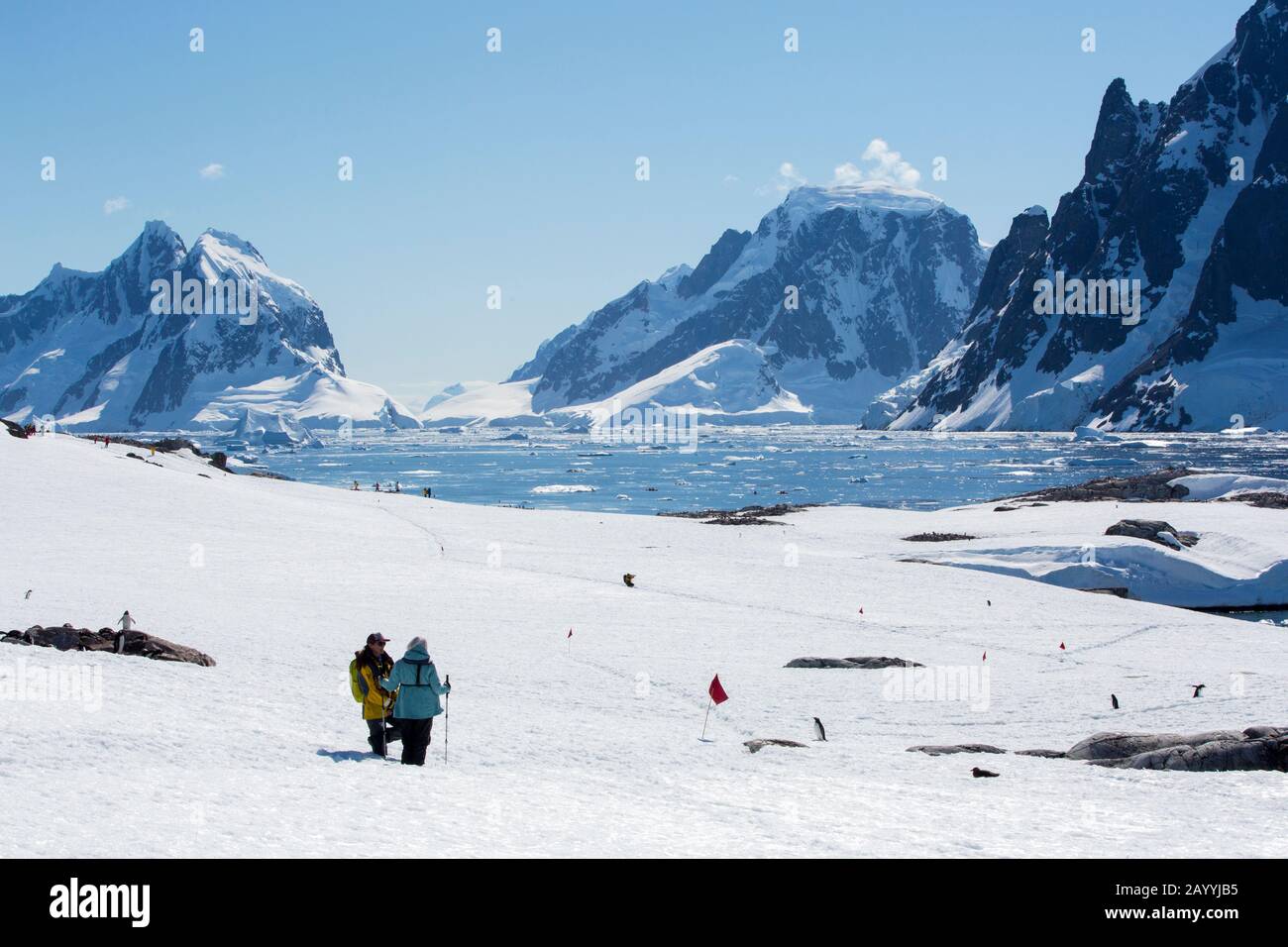 Tourists from an expedition cruise ship on Peterman Island near the ...