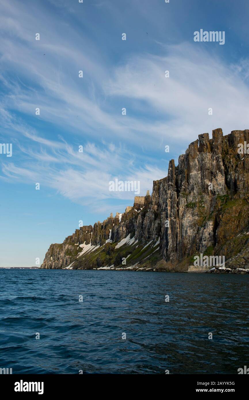 View of the bird cliff Alkefjellet at Lomfjordhalvøya in Ny-Friesland ...