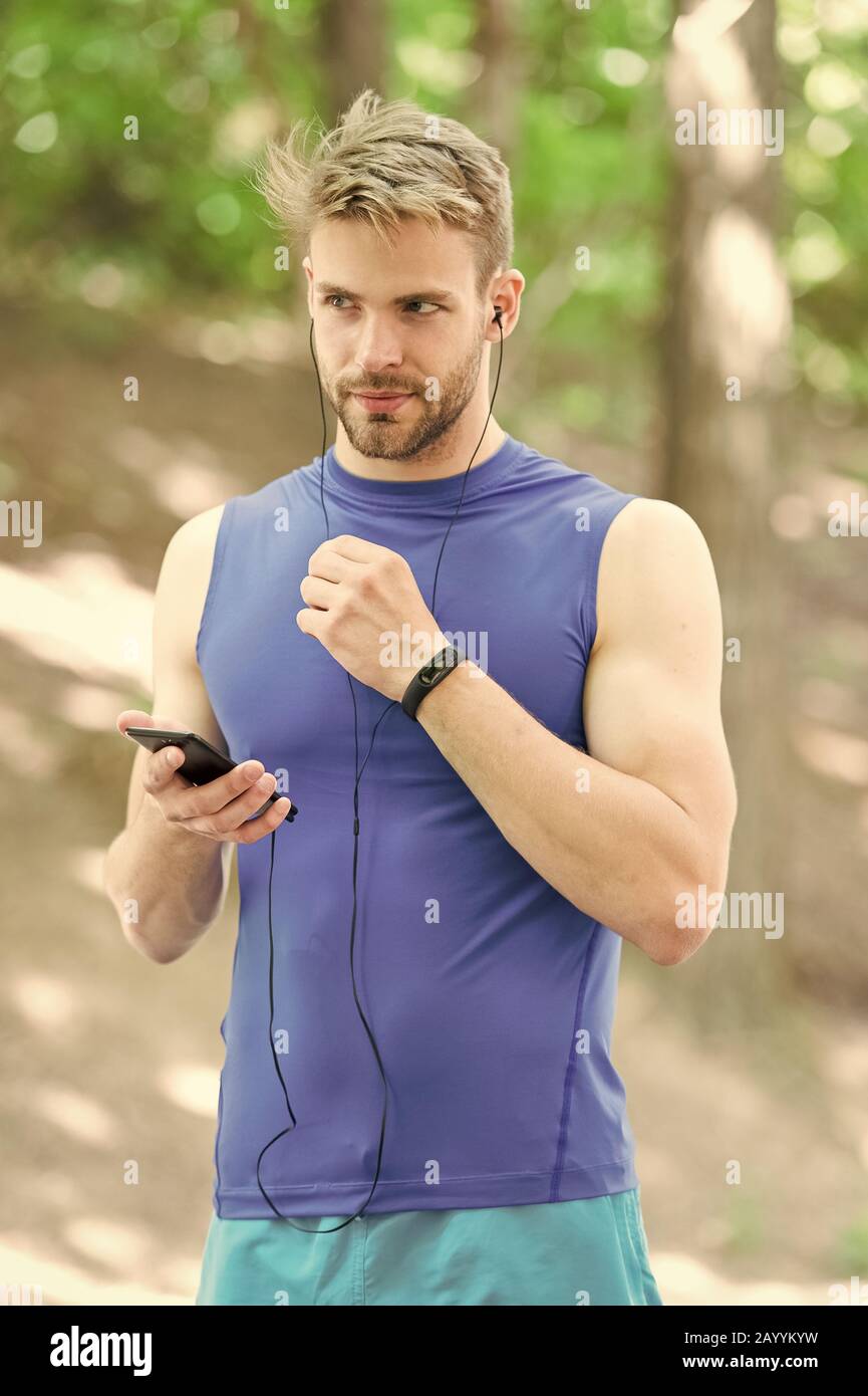 Data synchronization. digital sport. smart watch. athletic man in ...