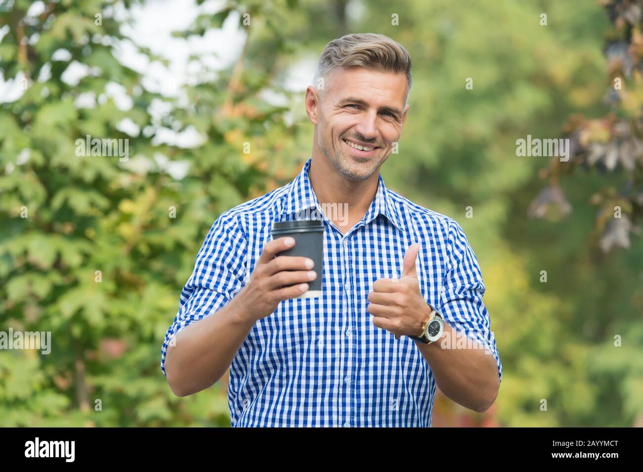 Coffee is my best friend. Happy man give thumbs up drinking coffee ...