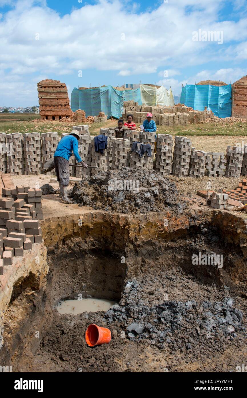 Man making bricks hi-res stock photography and images - Alamy