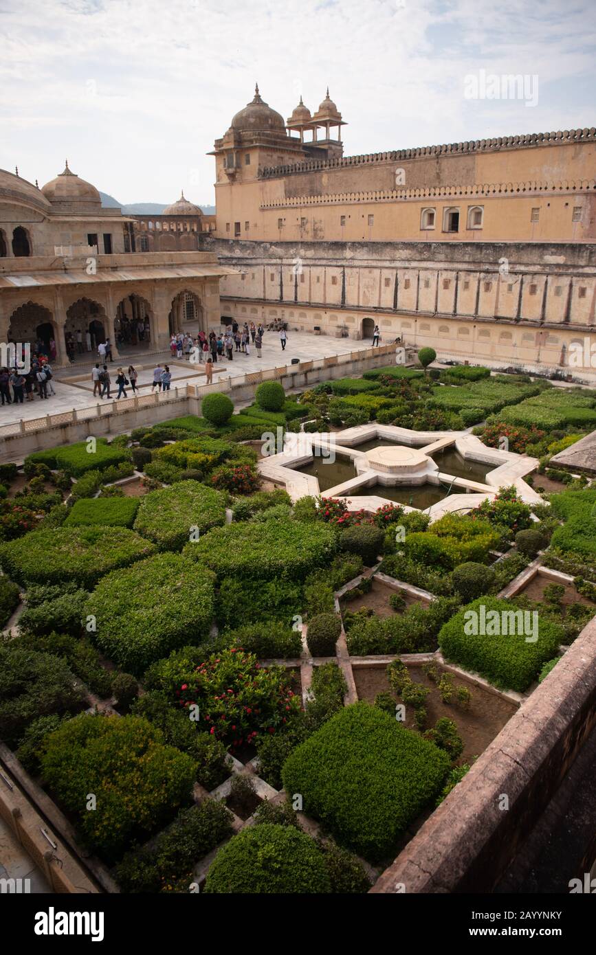 Visitors and tourists explore the ancient Amber Fort in Amer, Rajasthan ...