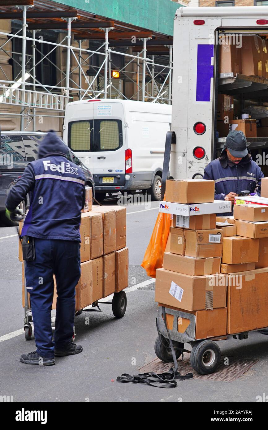NEW YORK, NY -1 FEB 2020- View of a pile of packages by a FedEx ...
