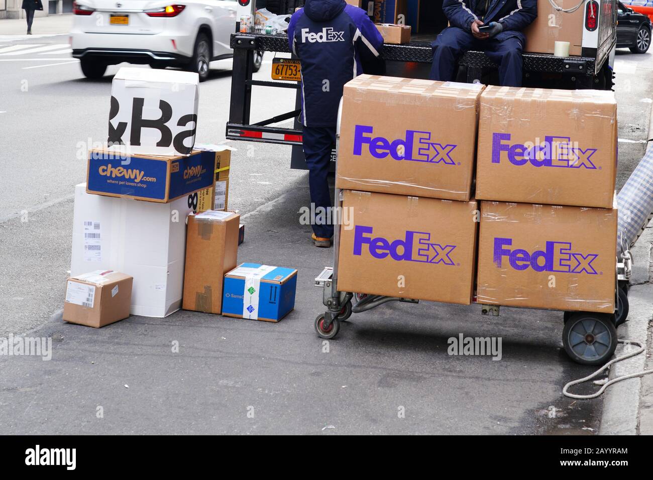NEW YORK, NY -1 FEB 2020- View of a pile of packages by a FedEx ...