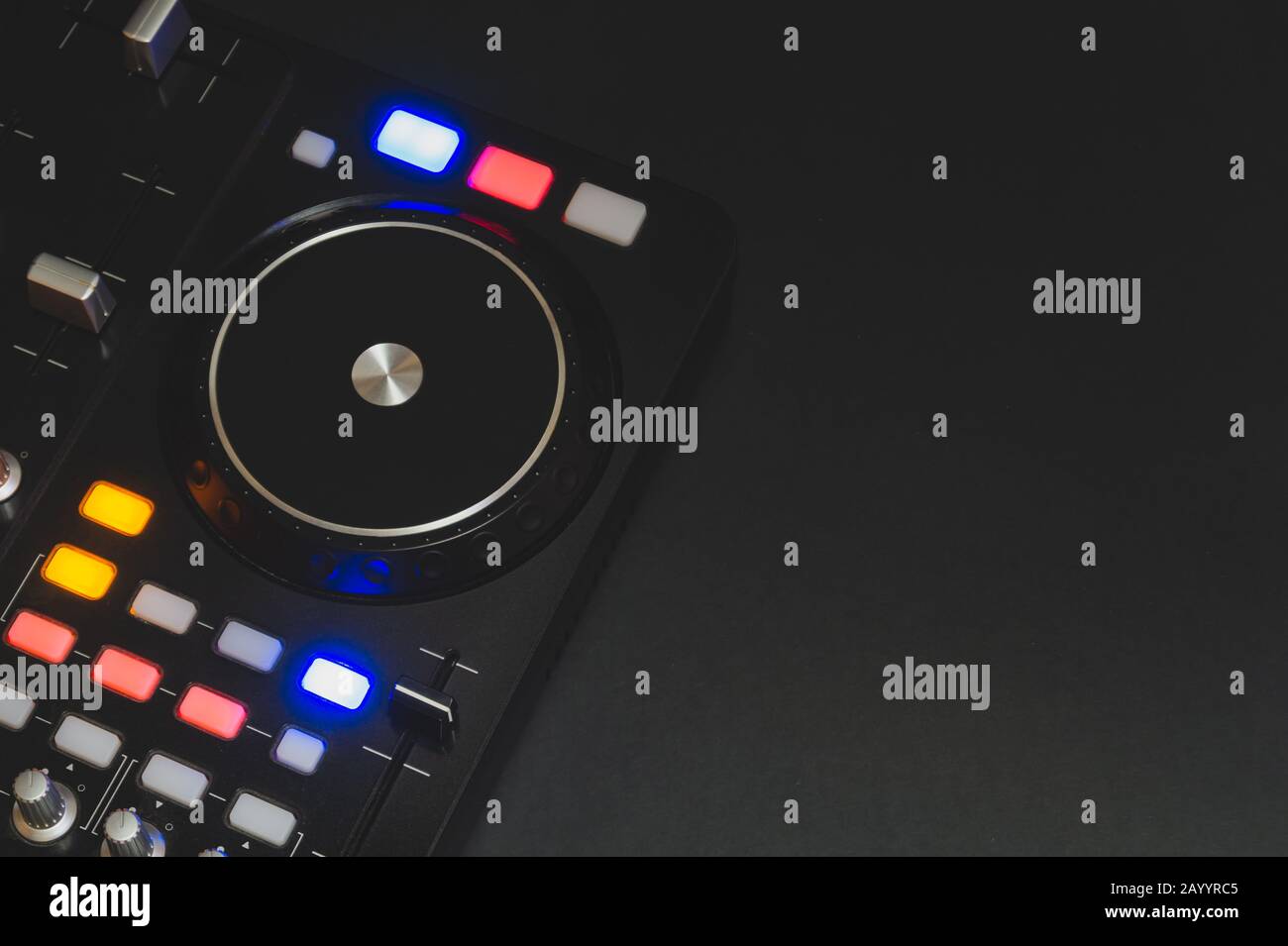 Dj sound mixer controller with knobs and sliders close up. audio mixing ...