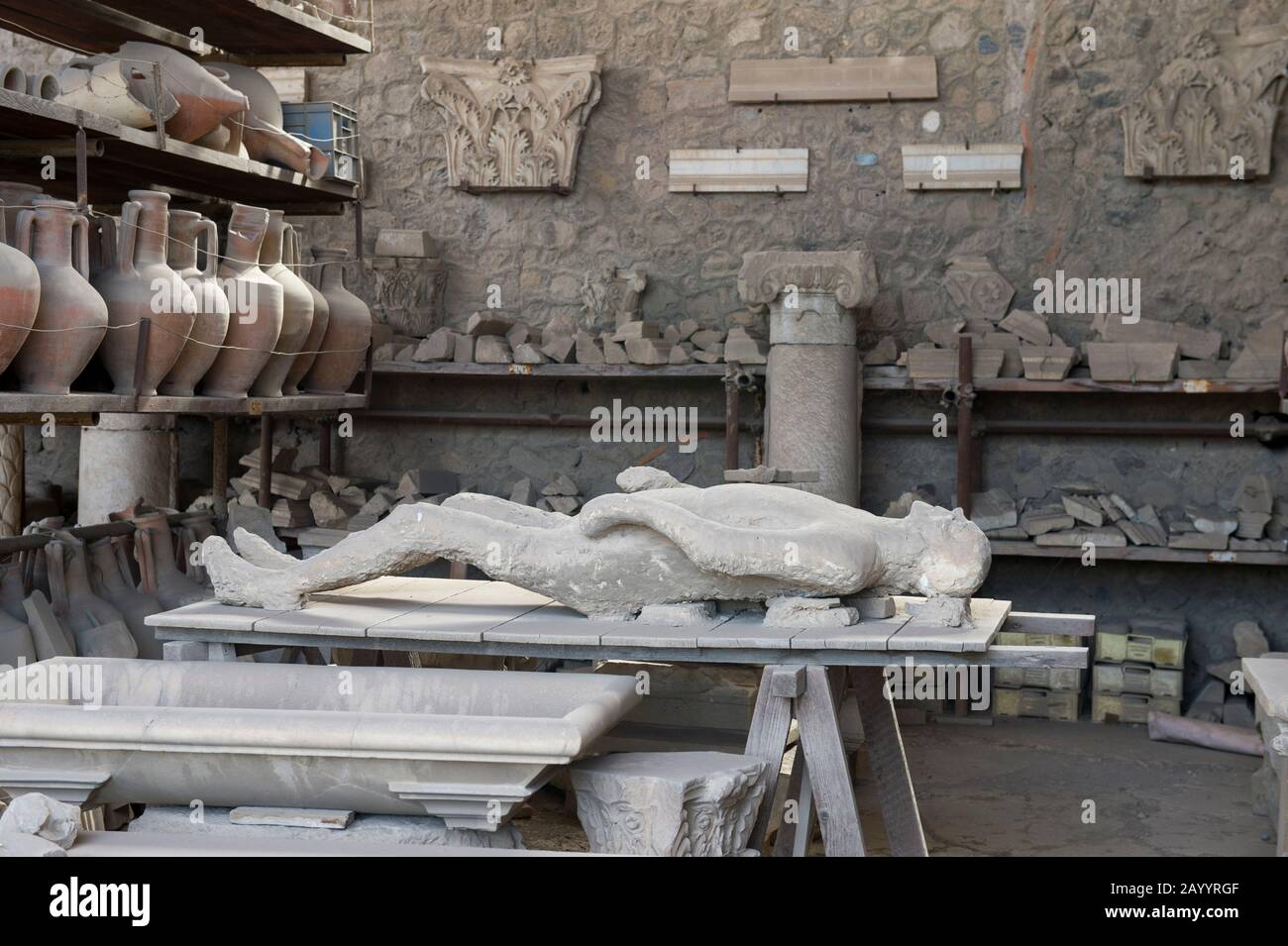 Plaster cast of a victim of the volcanic eruption in Pompeii near ...