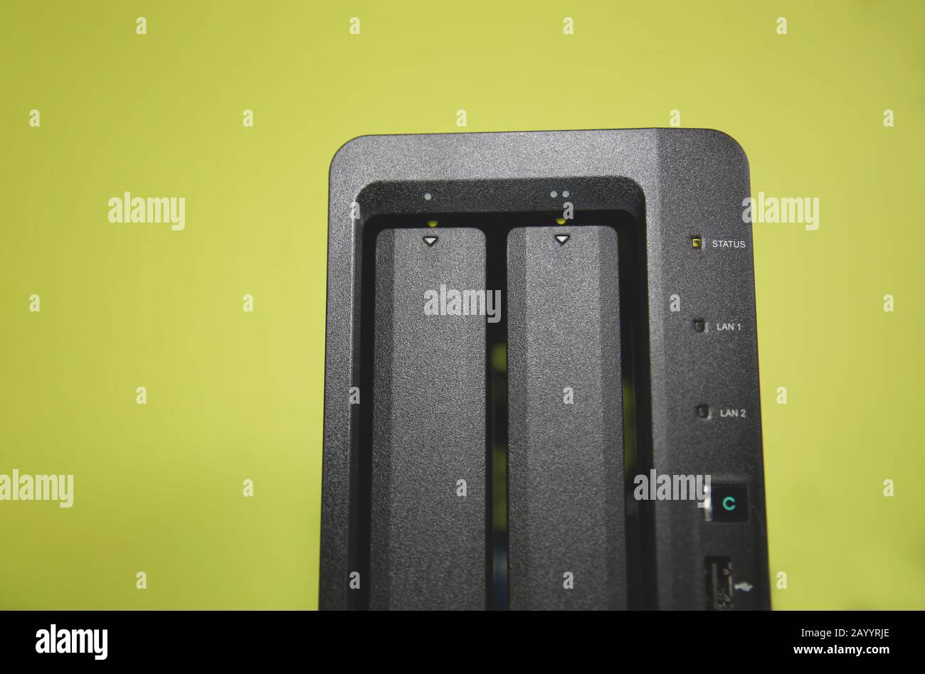 A NAS Network Attached Storage device with yellow background Stock ...