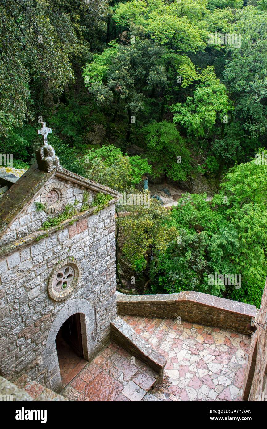 The Hermitage of St. Francis (Eremo delle Carceri) in a forest gorge at ...