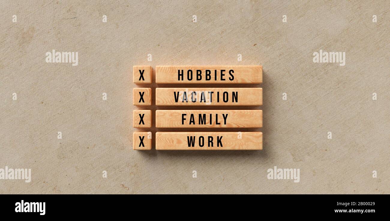 wooden blocks with the words HOBBIES, VACATION, FAMILY and WORK on ...