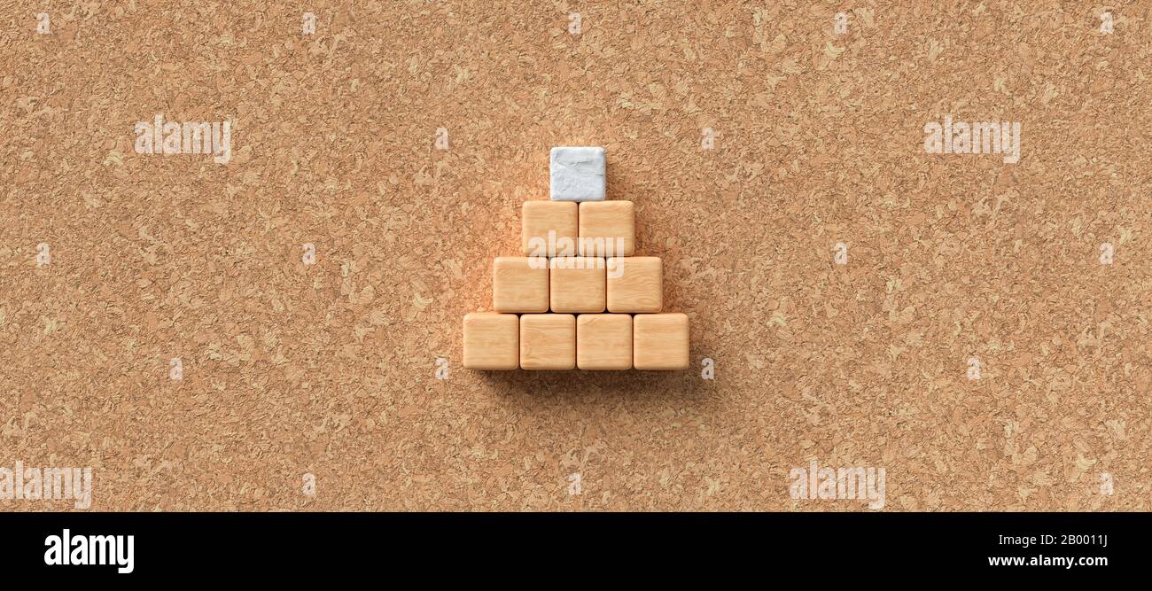 empty wooden blocks for own text formed as a pyramid on cork background ...
