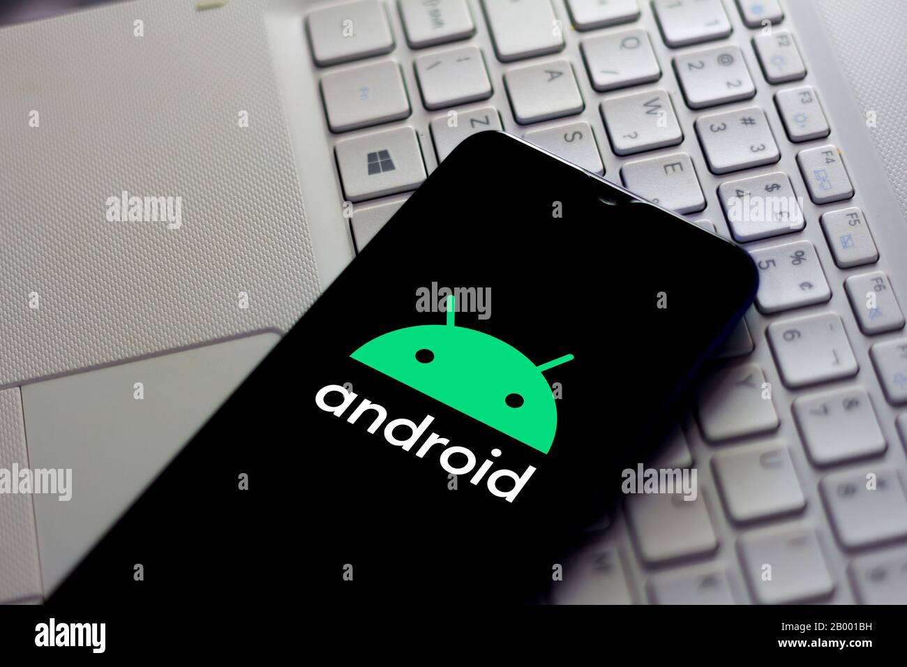 In this photo illustration the Android logo seen displayed on a ...