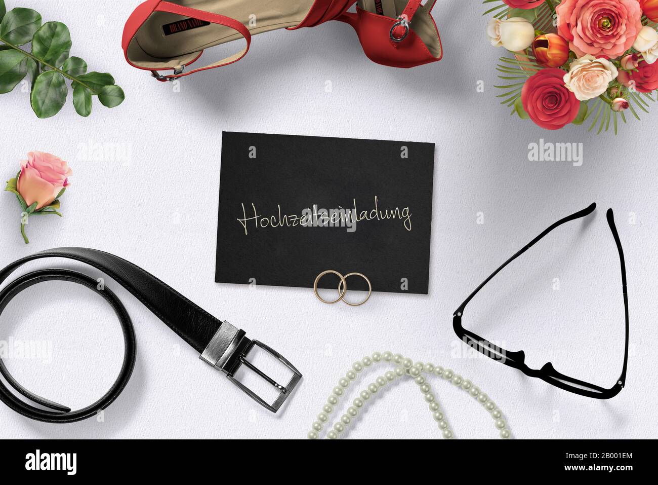 wedding decoration with rings and envelope with German message for ...