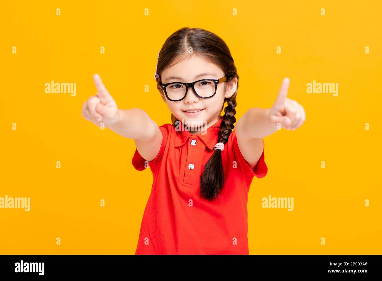 Adorable student girl hand showing and pointing something Stock Photo ...