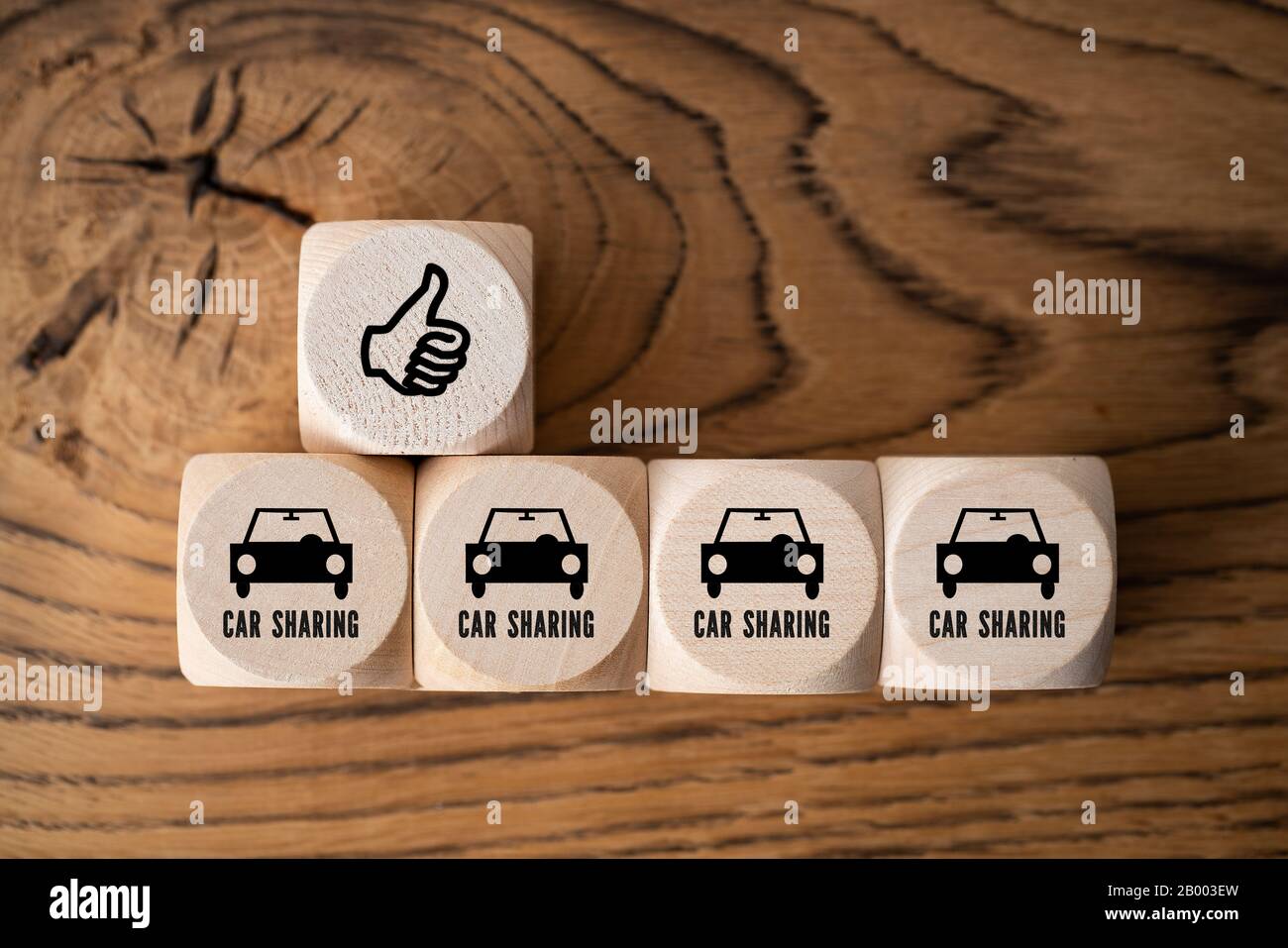 cubes with car sharing symbols on wooden background Stock Photo - Alamy