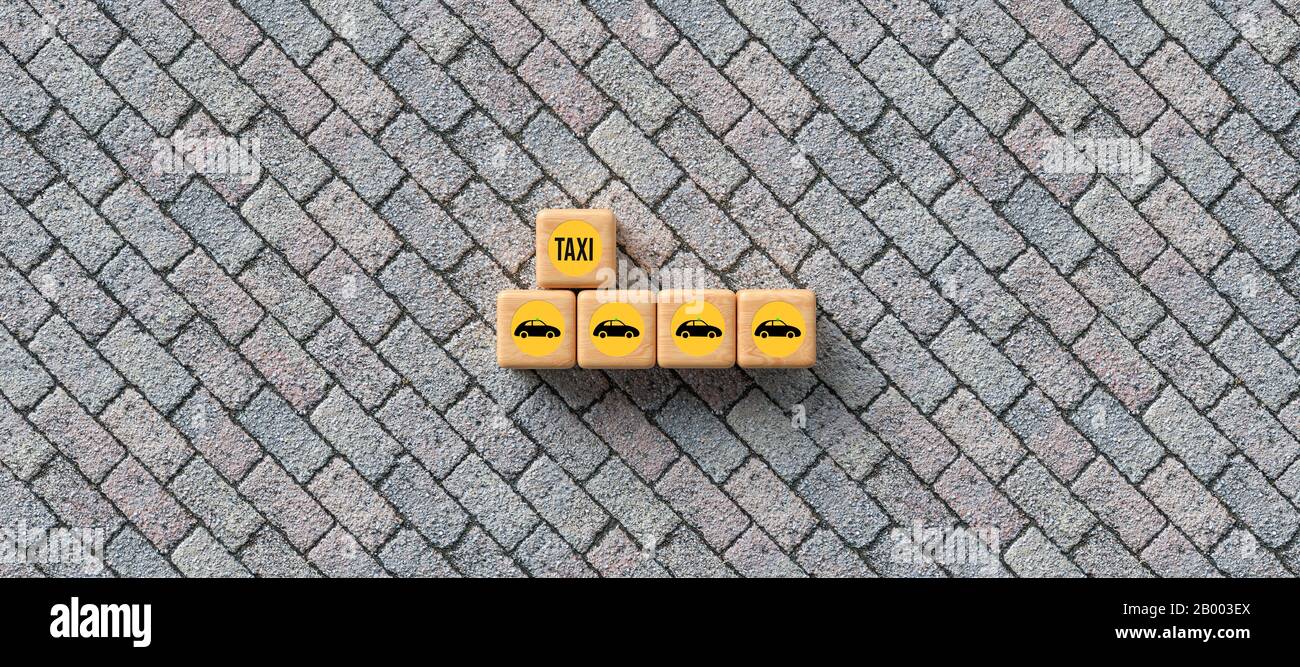 cubes with car symbol and text TAXI on stone background - 3d rendered ...