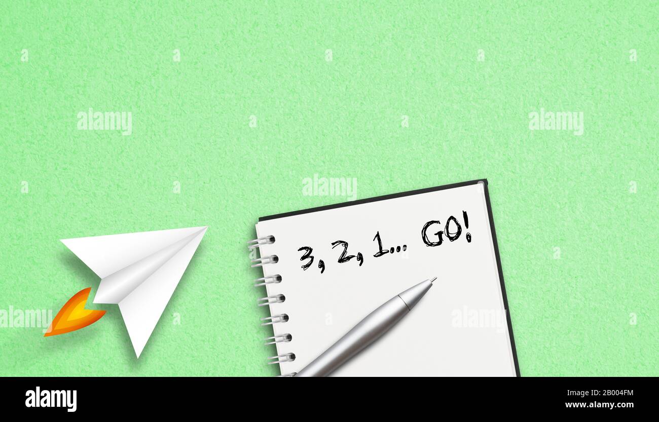 "3, 2, 1 Go" concept written on a notepad lying on paper background ...