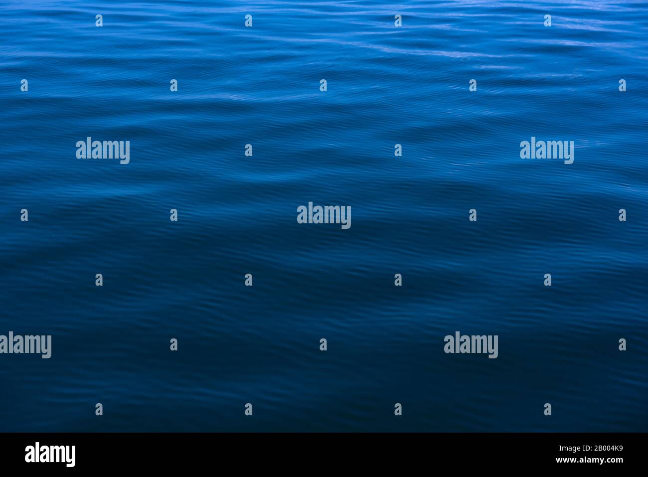 Blue water background with ripples Sea low angle view, Ocean, Wave ...