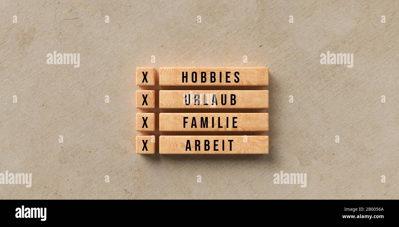 wooden blocks with the German words for HOBBIES, VACATION, FAMILY and ...