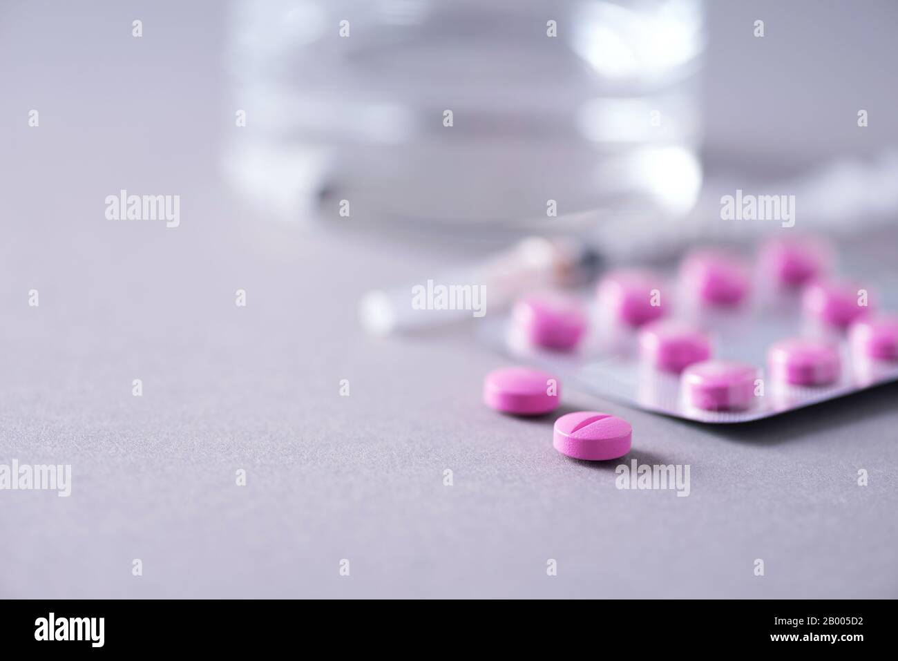 Pink grey capsule pills hi-res stock photography and images - Alamy