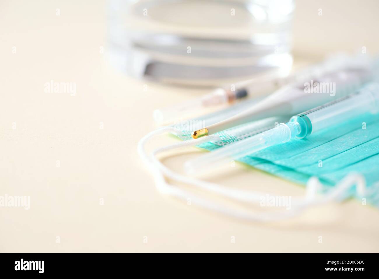 Concept of flu treatment - pills, capsules, thermometer, protective ...