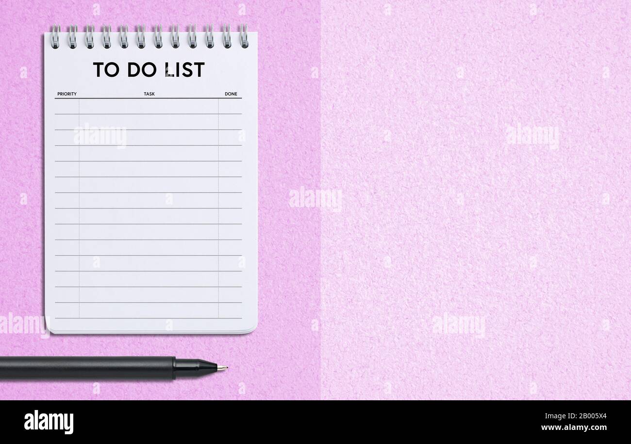 to do list notepad on blue paper background Stock Photo - Alamy