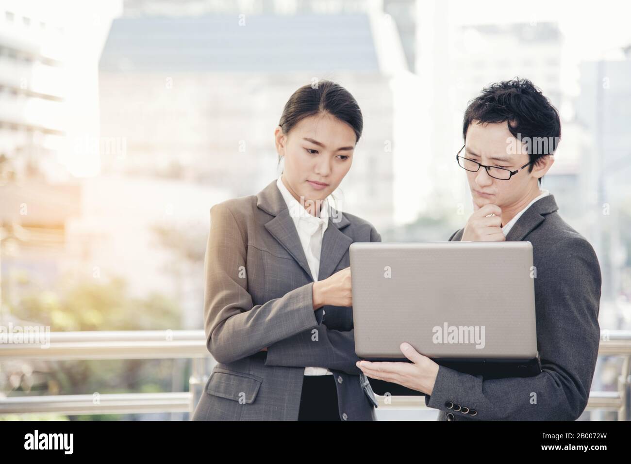Business team conference. Team collaborator worker discussing in a cafe ...