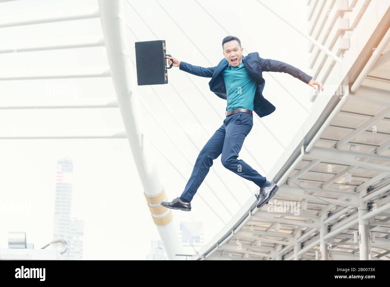Businessman jumping air hi-res stock photography and images - Alamy