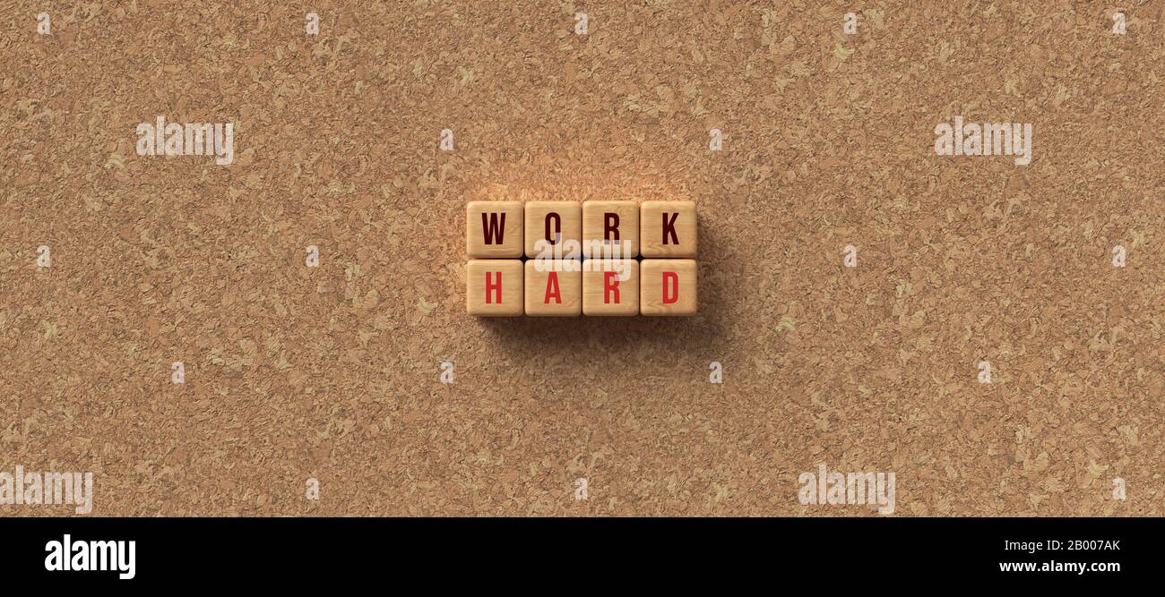 cubes showing the message WORK HARD on cork background - 3D rendered ...