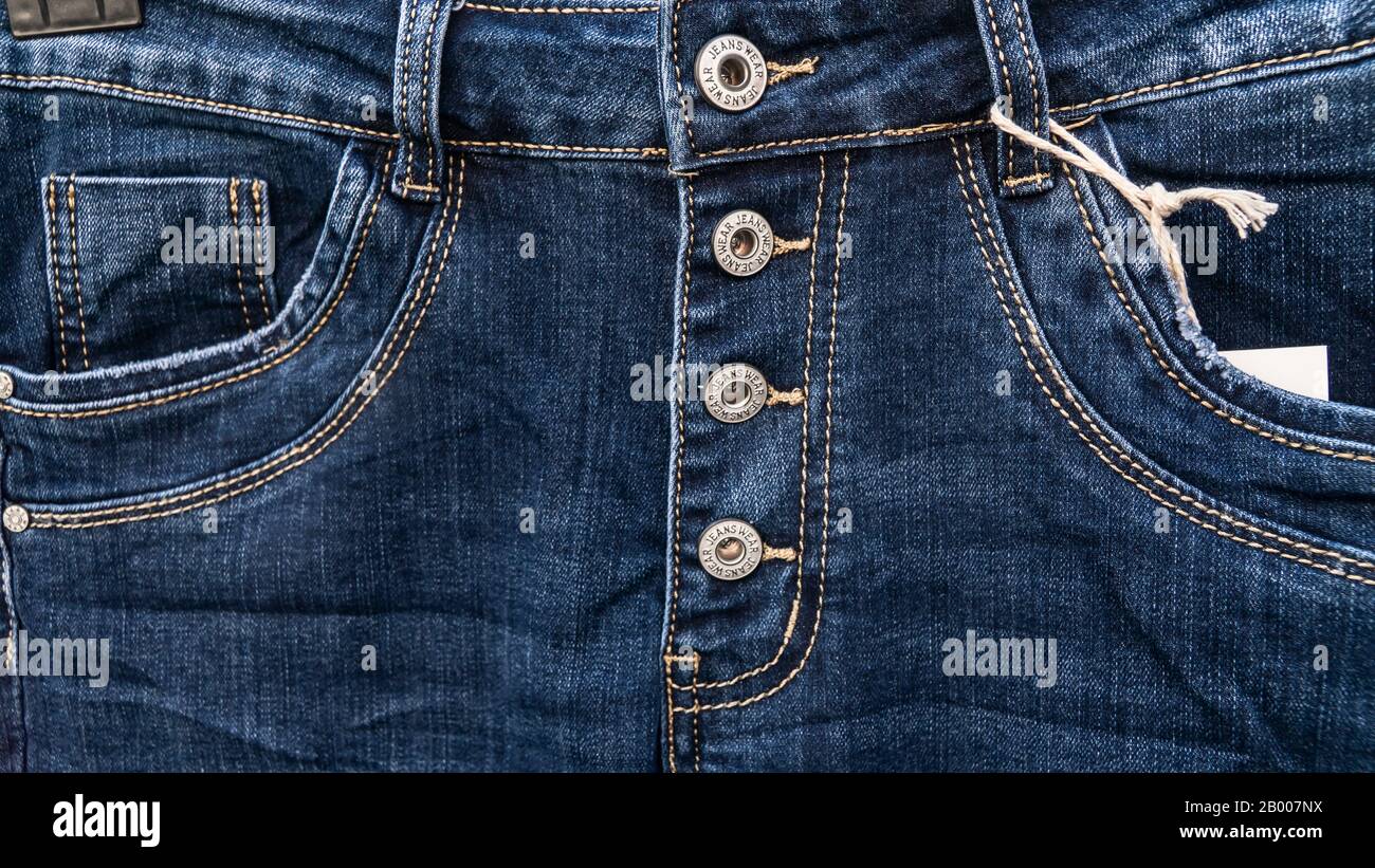 Modern Blue Jeans in with Buttons Detail Stock Photo - Alamy