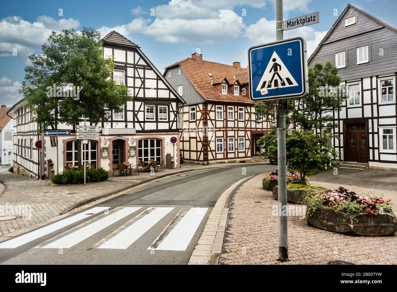 Half timbered houses and pedestrian crossing in Korbach in Germany ...