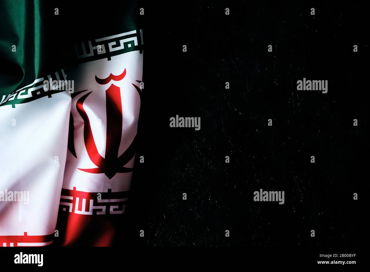 National flag of Iran on a dark background with space for text Stock ...