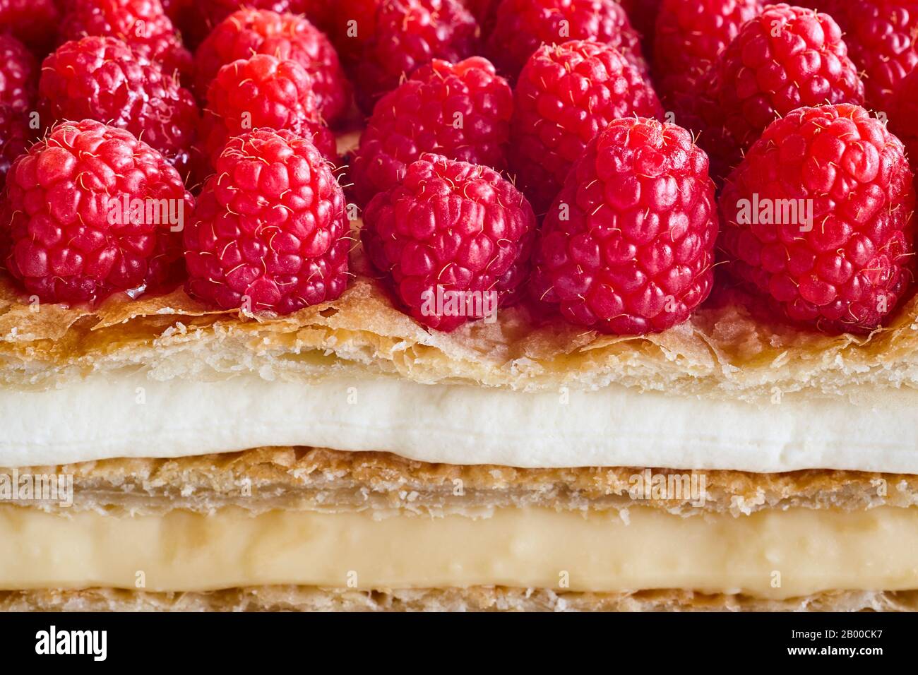 Delicious raspberry cake with puff pastry and cream. Homemade dessert ...