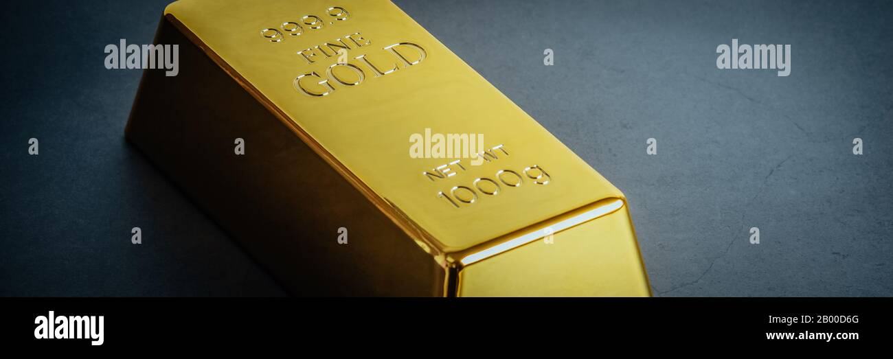 Gold bar ingot bullion on blue background. Located diagonally Stock ...