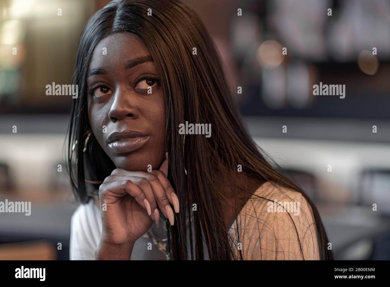 Dark skinned young woman, portrait, Duesseldorf, Germany Stock Photo ...