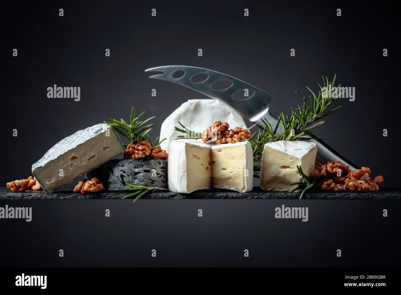 Various round cheeses hi-res stock photography and images - Alamy