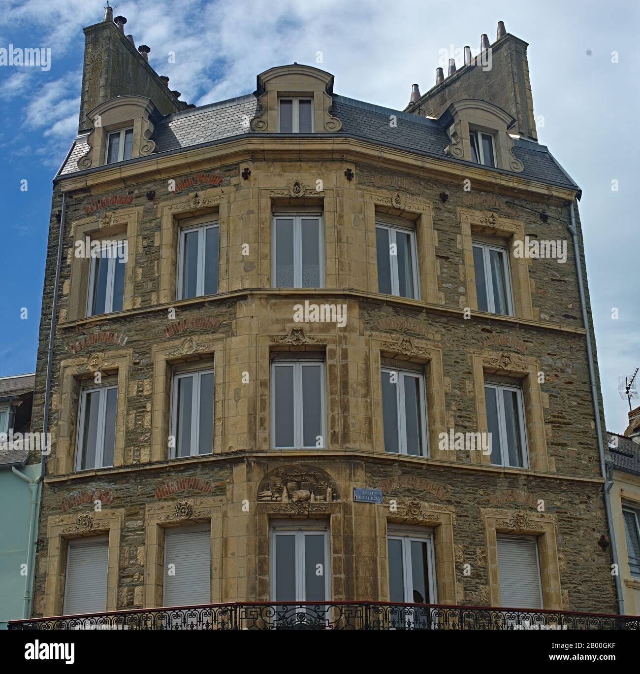 Old traditional French stone building with wooden windows Stock Photo ...