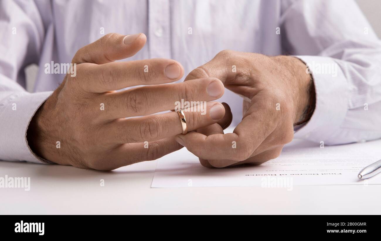 Man taking off ring hi-res stock photography and images - Alamy