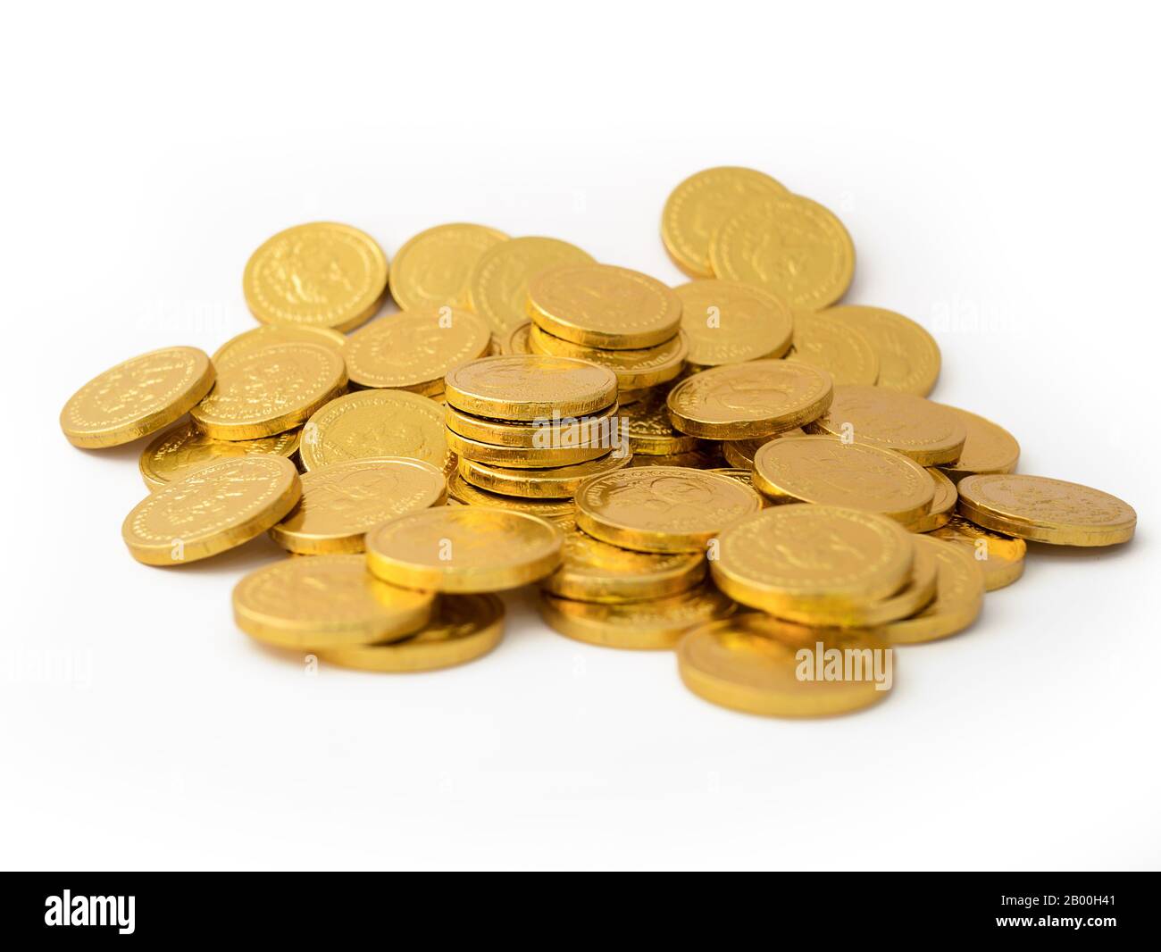 close up a pile of golden coins isolated on white background Stock ...