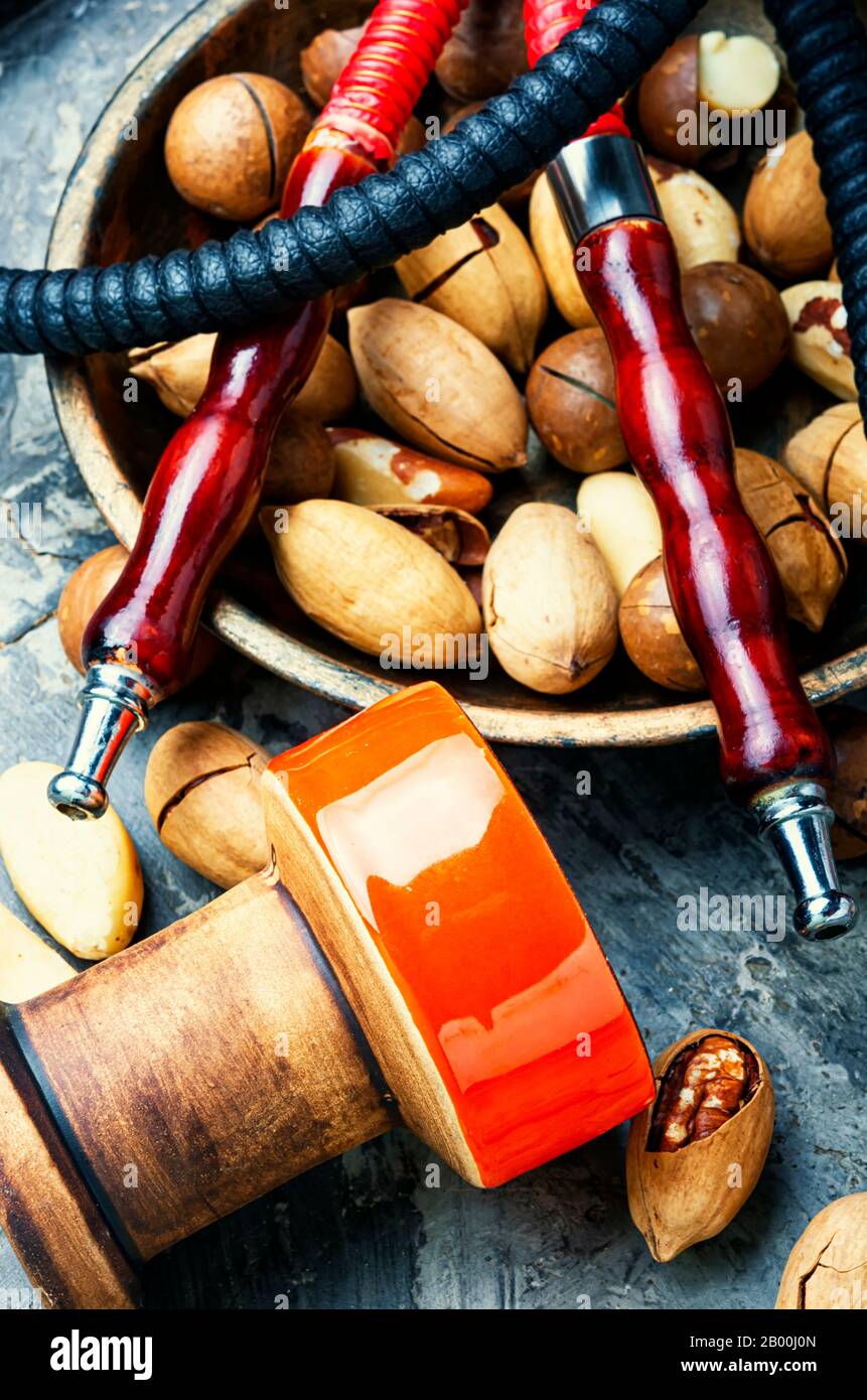 Tobacco smoking hookah with the aroma of nuts.Nuts shisha tobacco Stock ...