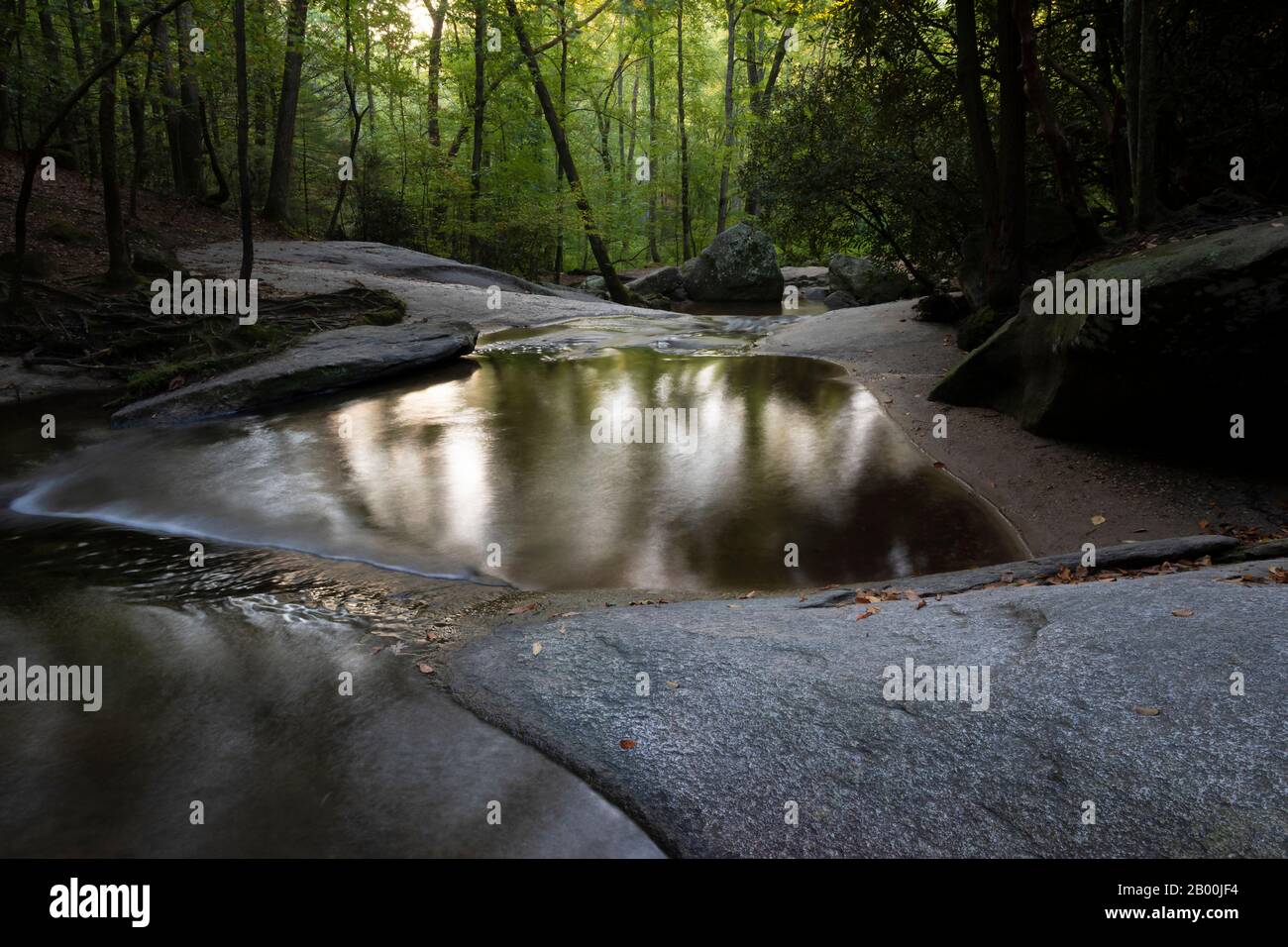 Water pools early the morning at Stone Mountain State Park Stock Photo ...