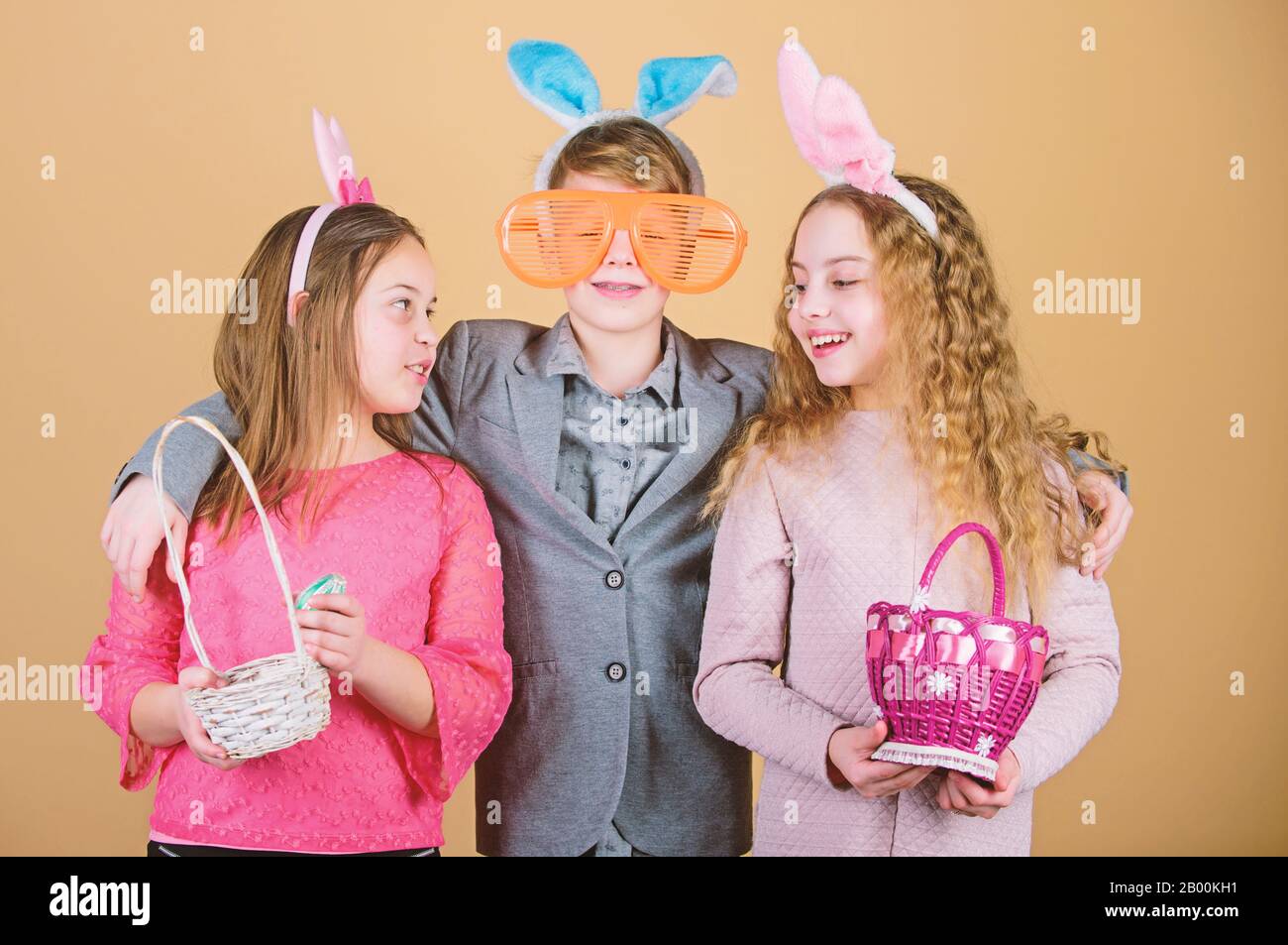 Children in rabbit bunny ears. Happy easter. Spring holiday party. Egg ...