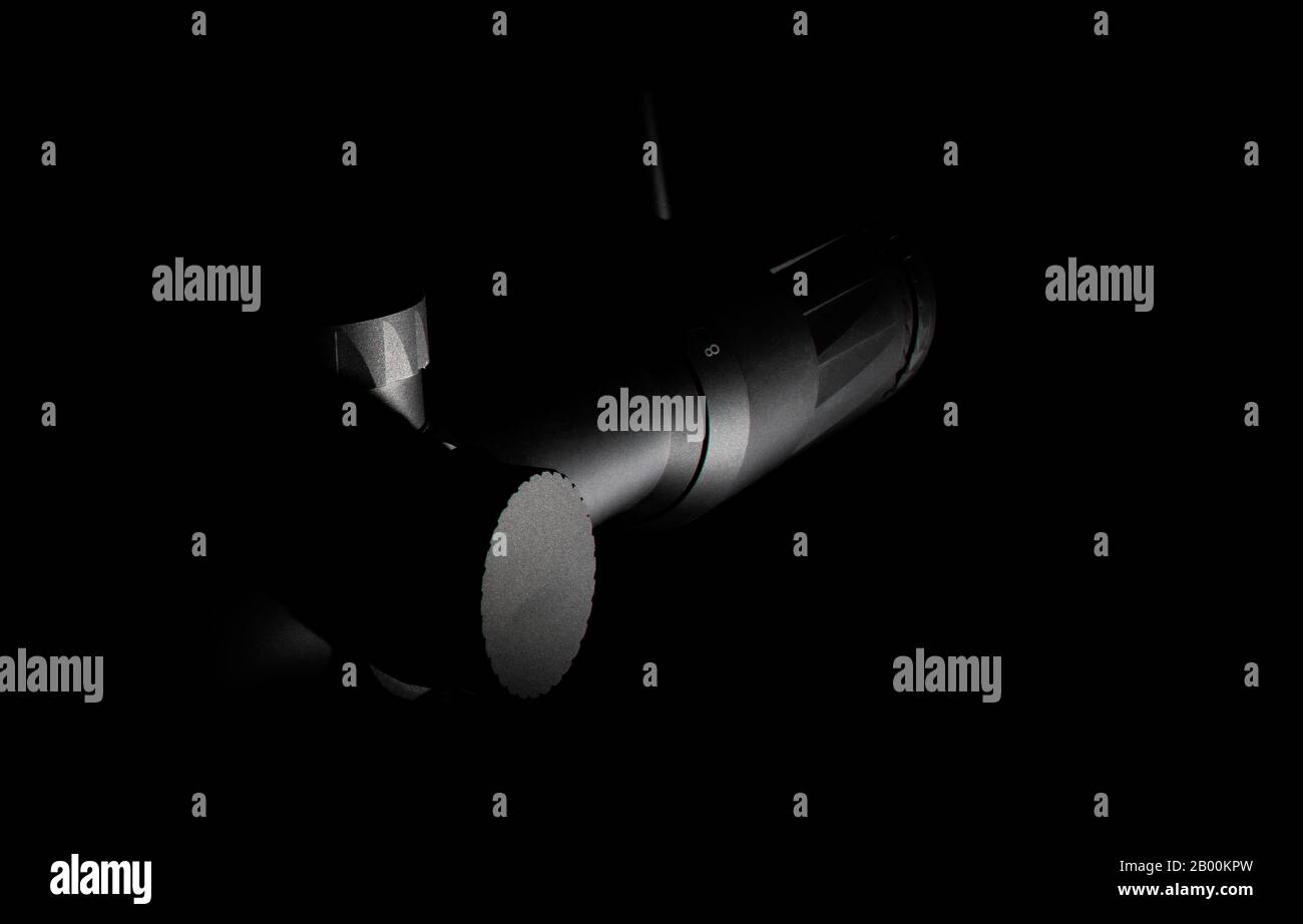 Mysterious looking scope for a rifle on a black background Stock Photo ...