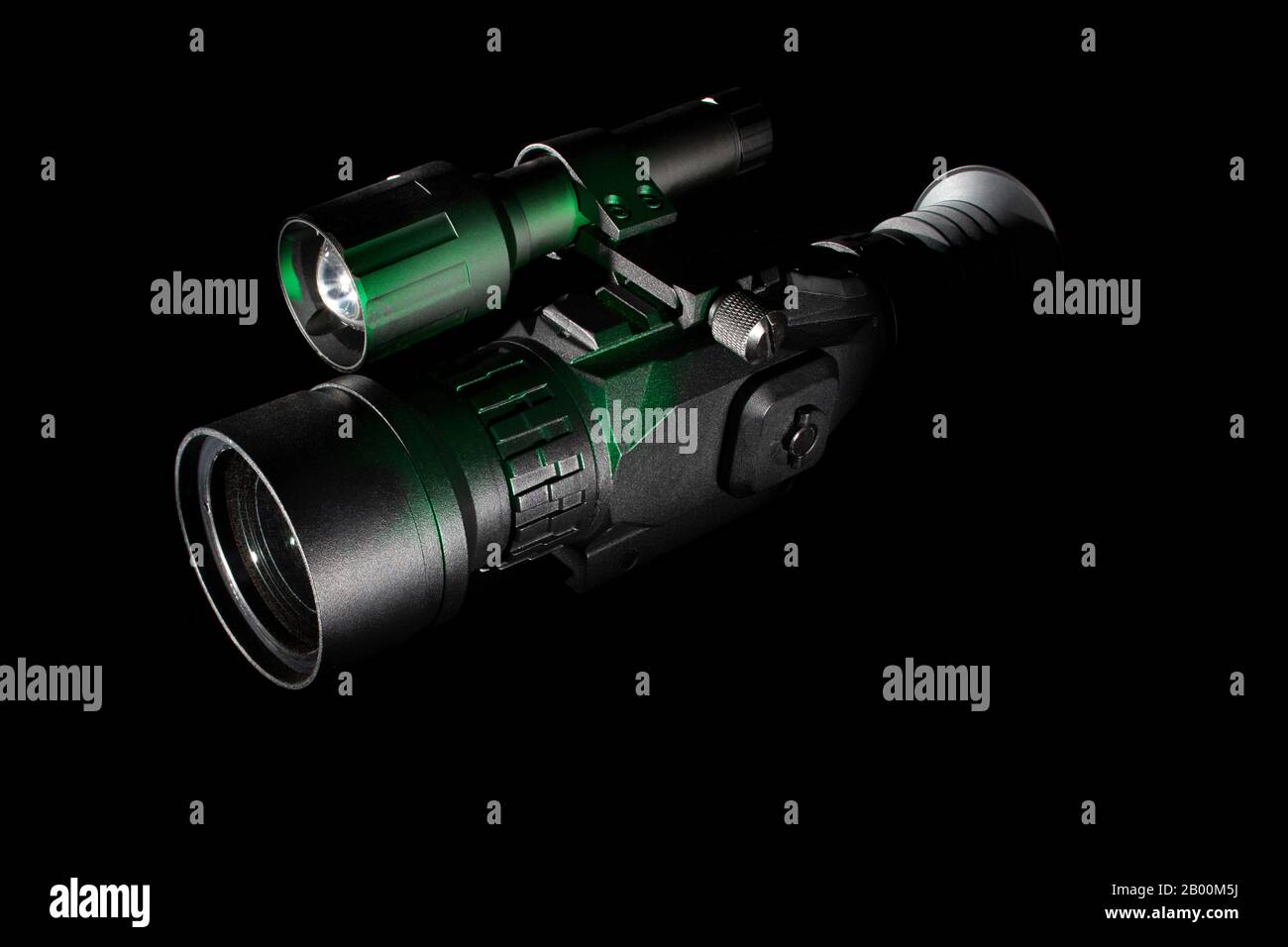 Night vision rifle scope with green light coming from the side Stock ...
