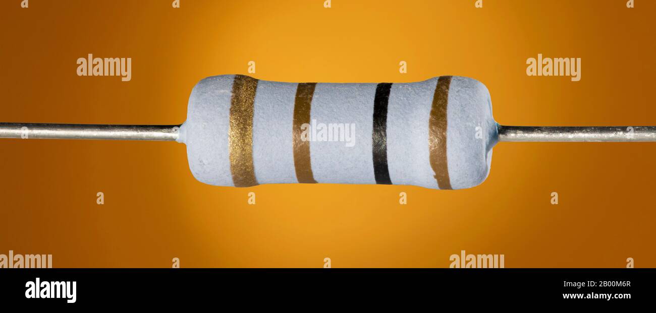 Resistor that is 100 ohms on an orange background Stock Photo - Alamy