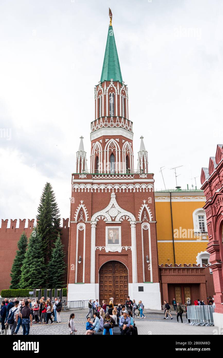 Red wall and watchtower of kremlin Palace near the Red Square in Moscow ...