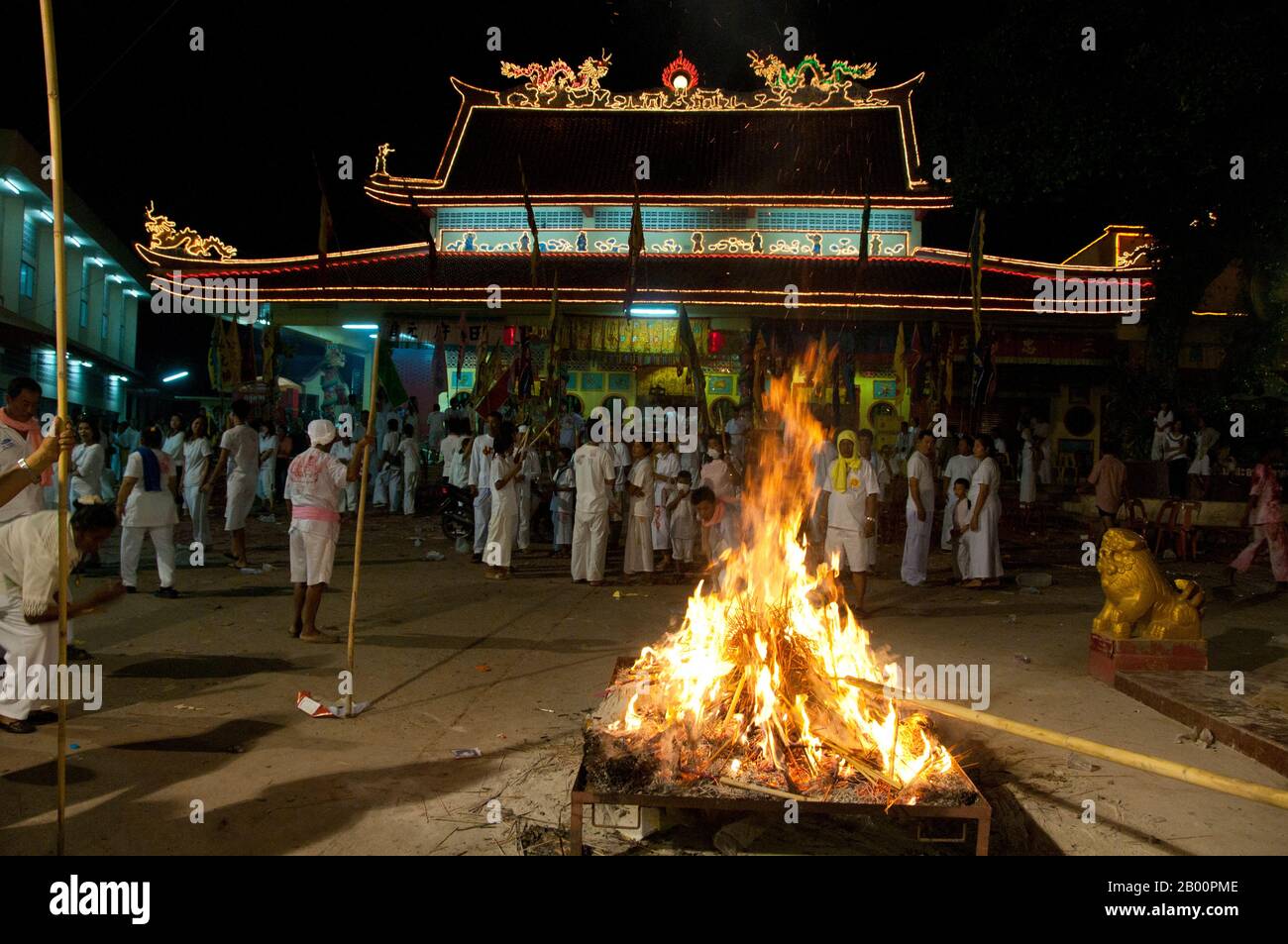 Thailand: A funeral pyre for lucky paper flags at San Chao Bang Niew ...